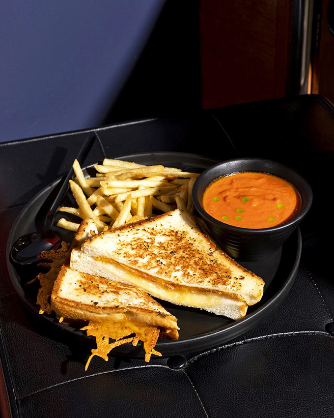 Grilled cheese: childhood nostalgia meets grown-up execution. That tomato soup looks like it could solve all of life's problems.