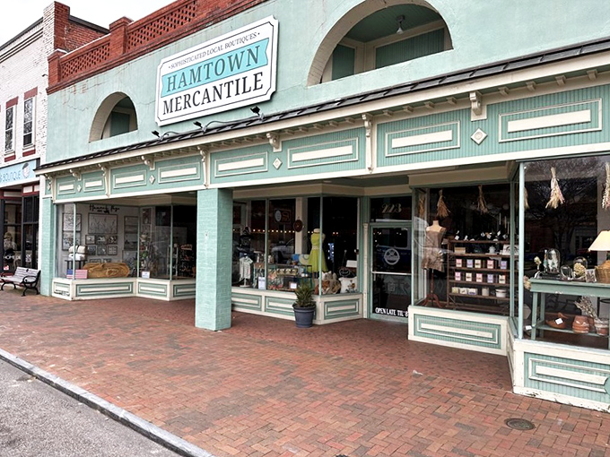 Hamtown Mercantile's mint-green facade houses treasures waiting to be discovered. The kind of shop where you find gifts you end up keeping for yourself.