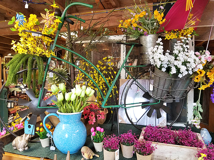 Garden whimsy meets practical repurposing&mdash;where watering cans become planters and yesterday's farm implements transform into today's garden art.