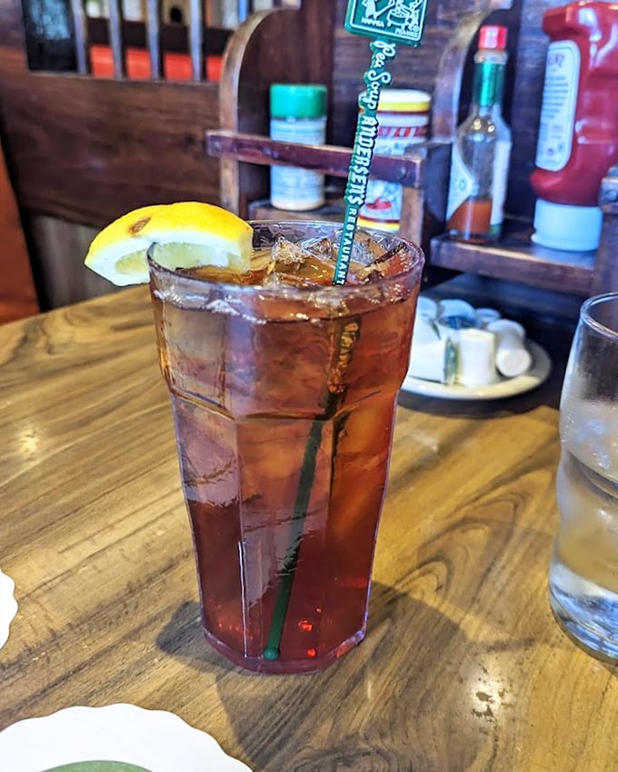 Their iced tea arrives in a glass tall enough to quench a desert-crossing thirst, complete with the restaurant's signature straw.
