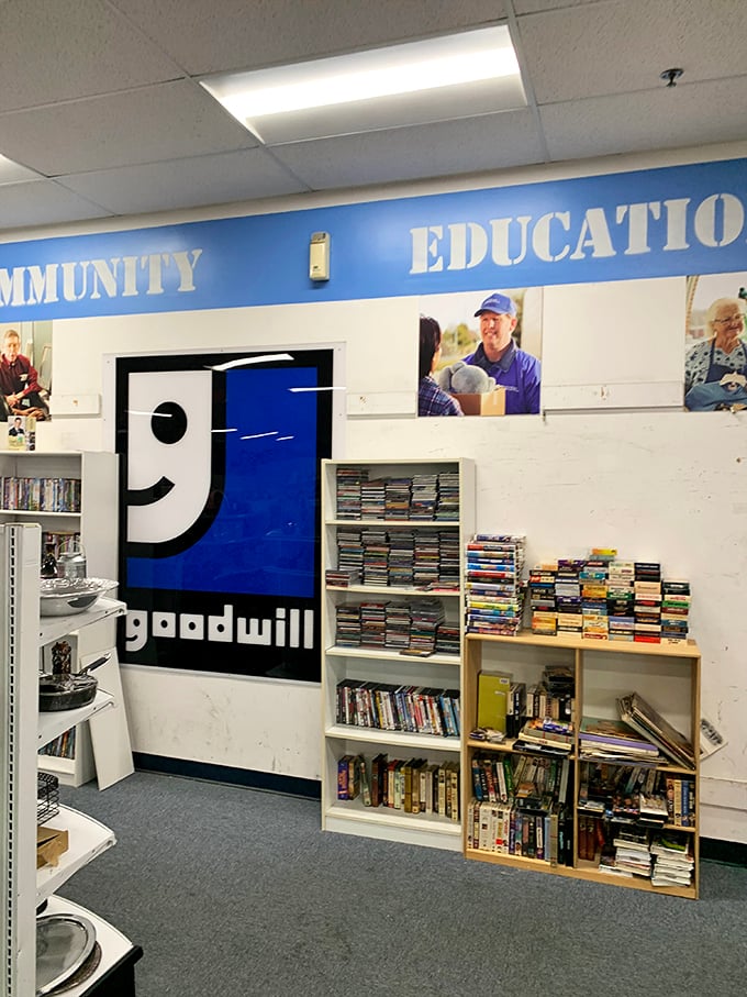 The Goodwill mission statement surrounds the iconic smiling logo. Every purchase here supports education and community programs.