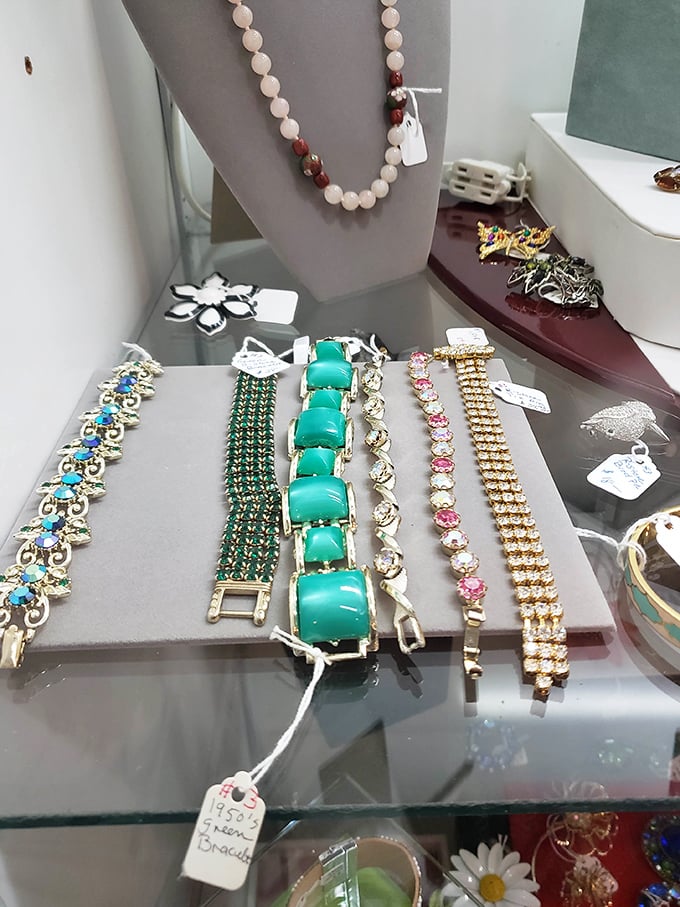 Jewelry case glittering with mid-century treasures &ndash; that turquoise bracelet in the center would have made Elizabeth Taylor raise an approving eyebrow.
