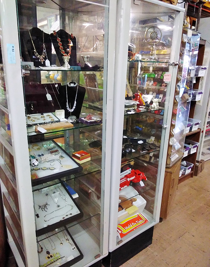 Jewelry that once adorned someone's special moments now waits behind glass, each piece a tiny time capsule of personal style and celebration.