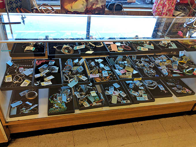 The jewelry counter gleams with possibility&mdash;each tray a constellation of accessories waiting to complete your next outfit.