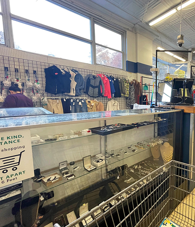 The jewelry counter gleams with potential statement pieces. Behind that glass lies someone's perfect conversation starter, waiting to be discovered for pocket change.