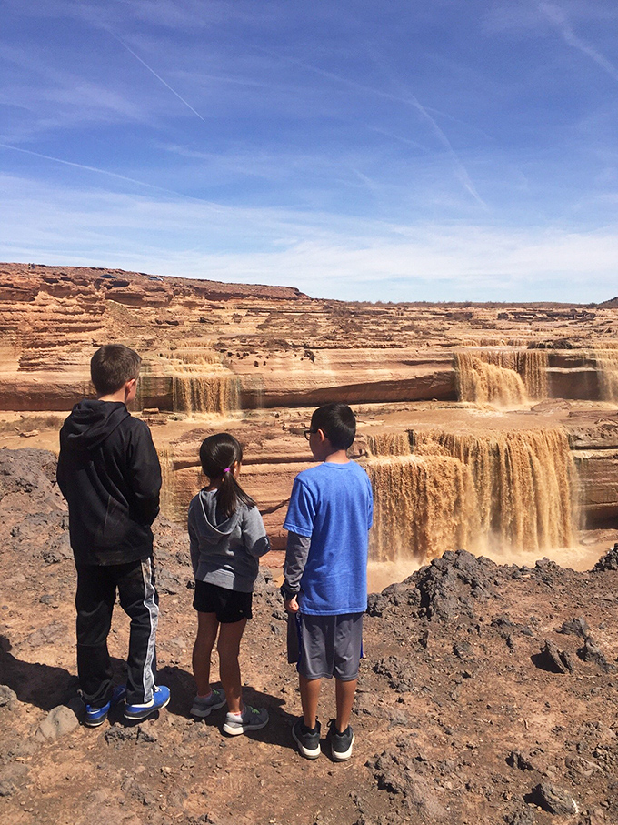 Multi-generational wonder: Grand Falls captivates visitors of all ages, proving that nature's spectacles still outperform digital entertainment every time.