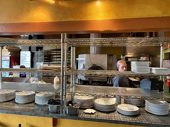 Where the magic happens. Those stacked plates aren't just waiting&mdash;they're anticipating their moment in the spotlight of your dining experience.
