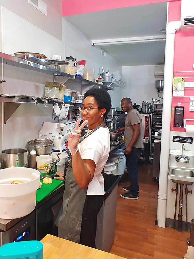 Where the magic happens. This kitchen may be compact, but the smiles tell you it's producing oversized flavor in every batch.