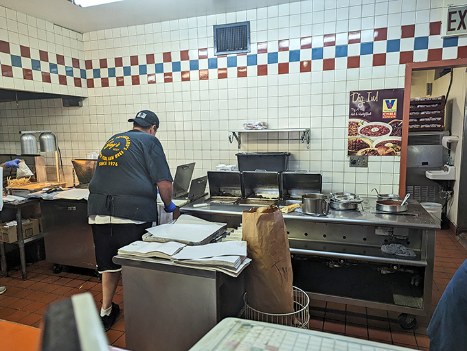 Behind the scenes, where the magic happens&mdash;skilled hands preparing beef that will soon become the highlight of someone's day.