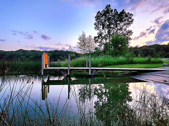 Sunset reflections on the dock create those postcard moments that make your friends wonder if you've secretly become professional.