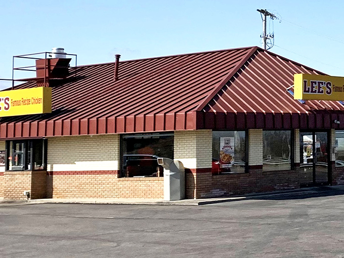 Yellow and red stripes signal classic fried chicken, the kind of comfort food that transcends geography and settles arguments.