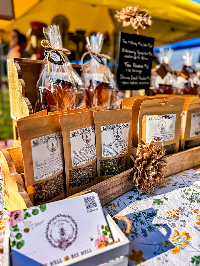 The farmers market spreads local honey and teas like edible postcards, each purchase supporting neighbors who actually know your name.
