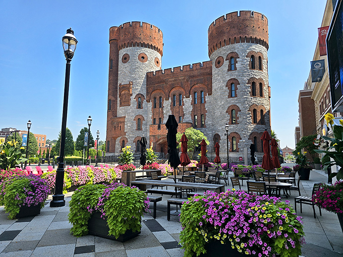 MGM Springfield's castle-like architecture creates an unexpected oasis of entertainment, surrounded by vibrant flowers rather than desert sand.