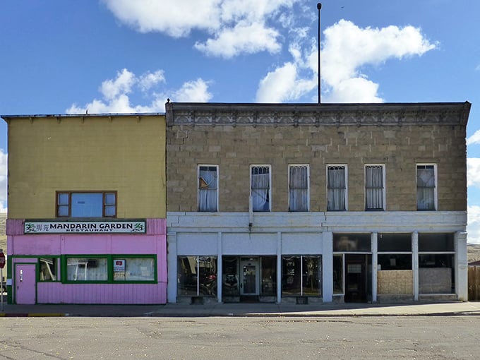 Mandarin Garden's cheerful pink facade brings unexpected color to Main Street, promising culinary journeys far beyond Wyoming's borders.