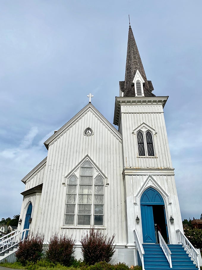 The Presbyterian Church's gleaming white facade and blue doors have witnessed generations of Mendocino life, standing tall against the coastal fog.