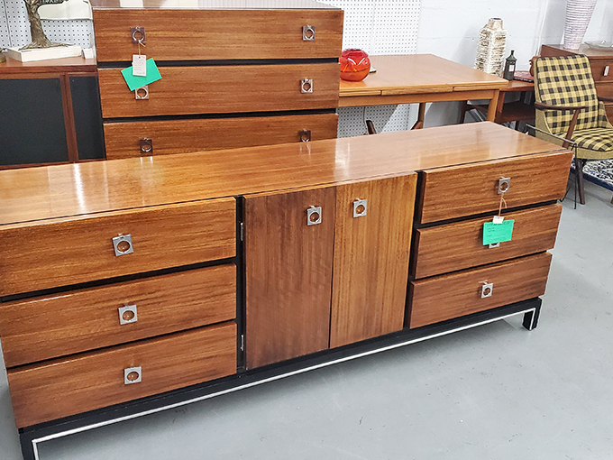 Mid-century modern furniture that Don Draper would fight you for. Clean lines and warm wood tones that make contemporary pieces look positively soulless.