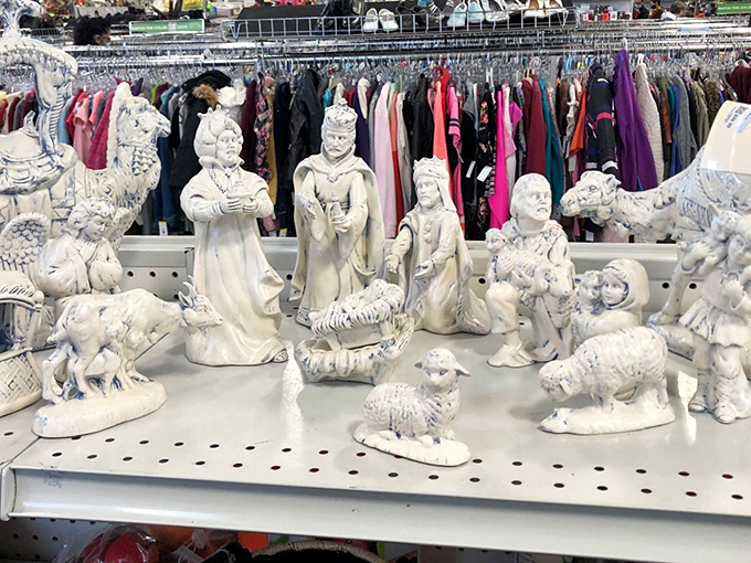This nativity scene waits patiently for December, porcelain figures frozen in eternal wonder regardless of the season.