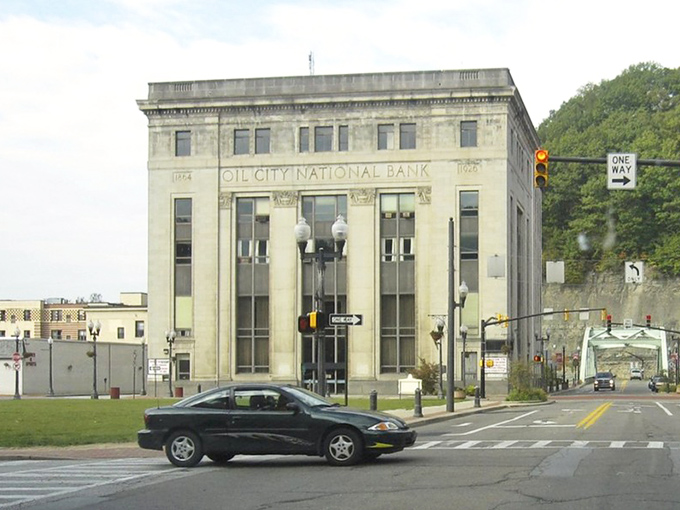 The imposing Oil City National Bank building anchors downtown with its neoclassical grandeur. When banks were built to last centuries, not just until the next merger.