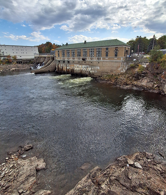 The hydroelectric dam harnesses the Kennebec's power, a reminder of Skowhegan's industrial heritage flowing alongside its natural beauty.