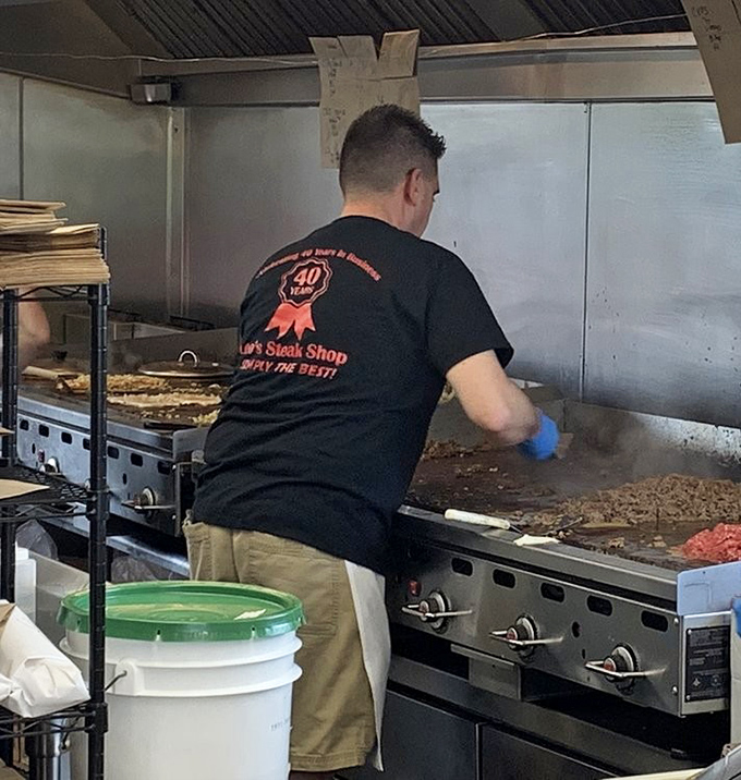 The sacred grill where magic happens. Decades of sandwich wisdom concentrated on one flat-top cooking surface.