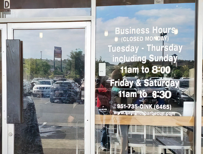 Business hours posted clearly&mdash;because knowing when you can get your next BBQ fix is essential information.