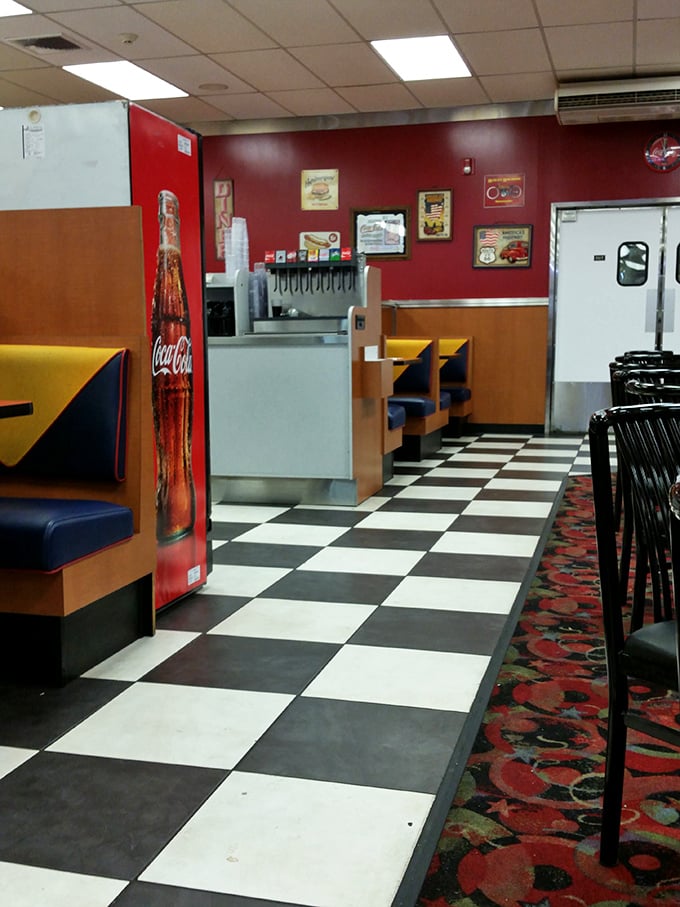 Classic diner aesthetics with checkerboard floors and booth seating&mdash;where conversations flow as freely as the coffee refills.