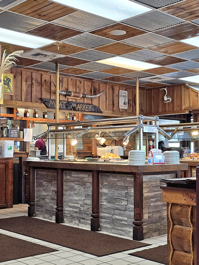 The "Meat Market" counter isn't selling anything but satisfaction. Rustic wood, stone accents, and practical serving stations prioritize substance over style.