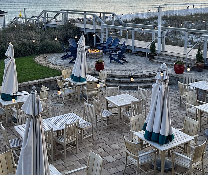 An outdoor patio designed for those moments when you need both cocktails and the sound of waves to wash away reality.
