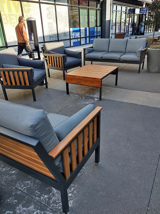 Strategically placed outdoor seating areas&mdash;retail architects' thoughtful gift to patient partners waiting for "just one more store."