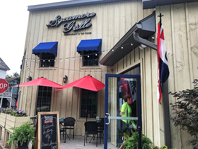 Sidewalk seating that lets you soak up small-town charm with your meal. The "OPEN" flag waves like a friendly neighbor saying "come on over!"