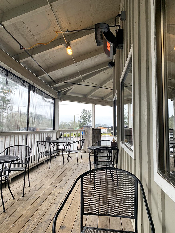 The covered porch offers al fresco dining with a side of Oregon weather-watching—perfect for contemplating the meaning of sandwich perfection.