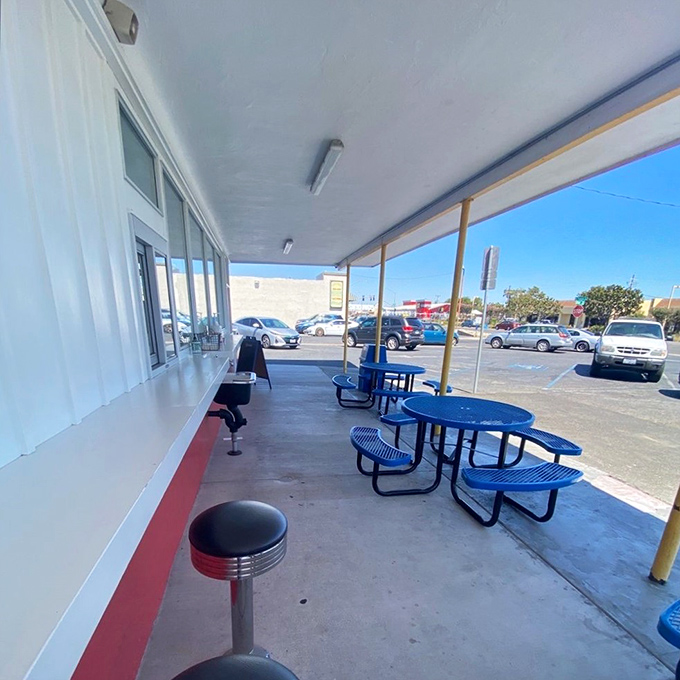 The outdoor seating area offers a no-frills dining experience where the only thing that matters is the giant burger you're about to enjoy.