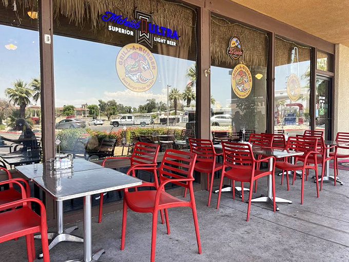 Bright red chairs on the patio invite you to enjoy your meal under the eternal California sunshine.
