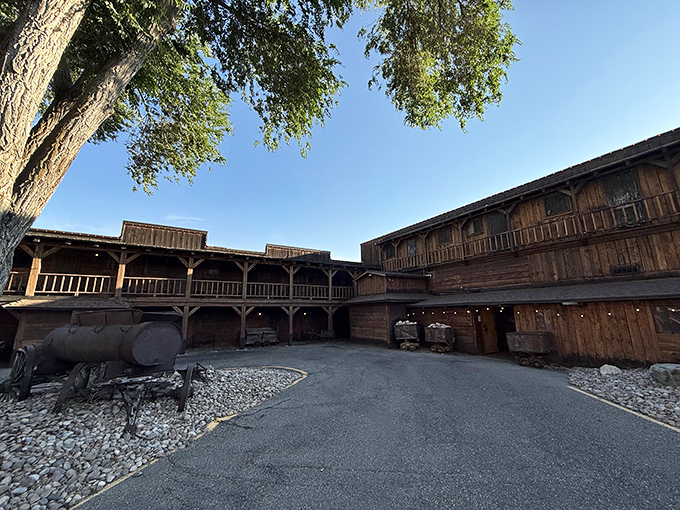 The exterior courtyard feels like a movie set where John Wayne might appear at any moment, tipping his hat before ordering the prime rib.