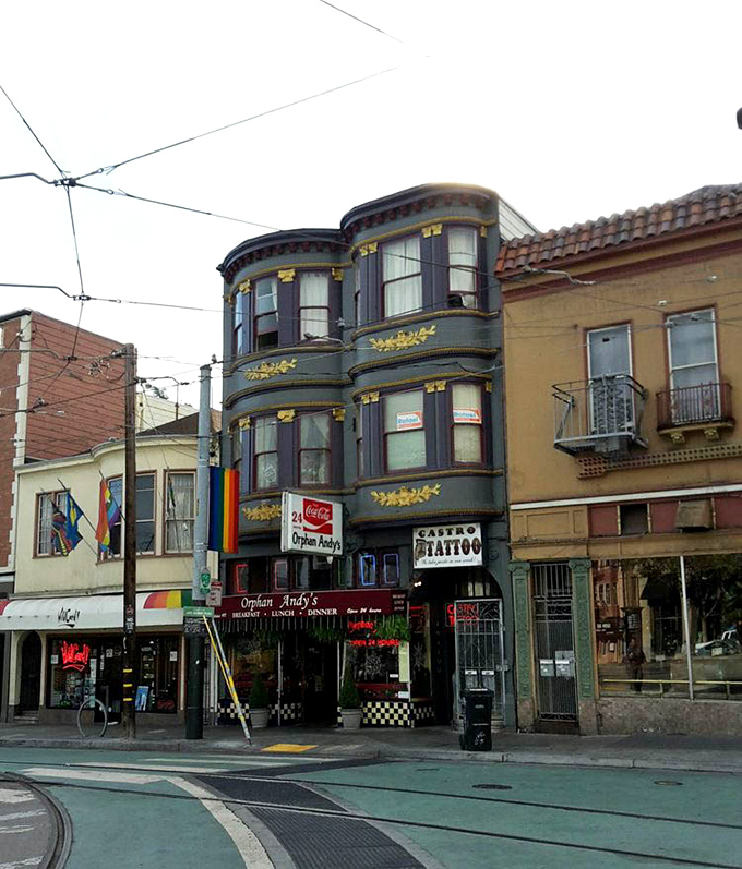 Victorian San Francisco architecture frames this beacon of late-night salvation, where trolley tracks lead hungry souls to satisfaction.