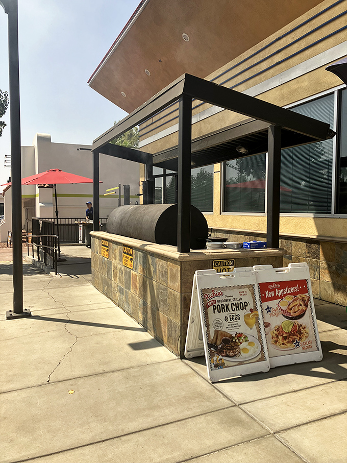 The outdoor grill hints at special events where the aroma of barbecue becomes an irresistible invitation to passersby.