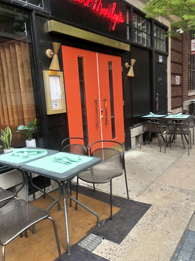 Al fresco dining with that signature orange door as your backdrop&mdash;the perfect spot to people-watch while savoring your meal on a pleasant Philadelphia day.