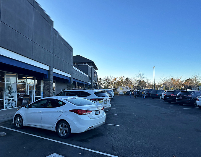 Early birds get the parking spots! Morning light illuminates the calm before the shopping storm at Seaside's retail paradise.