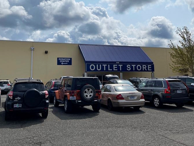 Parking lot filled with modern treasure ships. These vehicles will soon be loaded with bounty that costs less than the gas used to get here. 