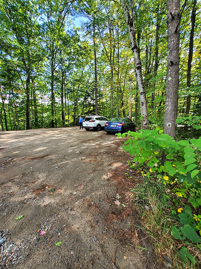 The humble parking area serves as a gateway to history&mdash;where modern vehicles rest before travelers step back in time.