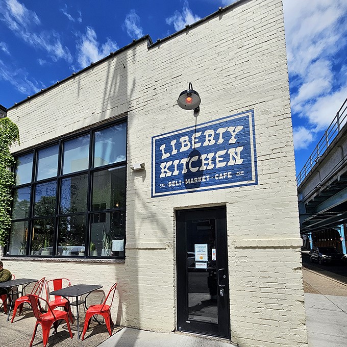 Outdoor seating with bright red chairs invites you to enjoy your hoagie under Philadelphia's occasionally cooperative sky.