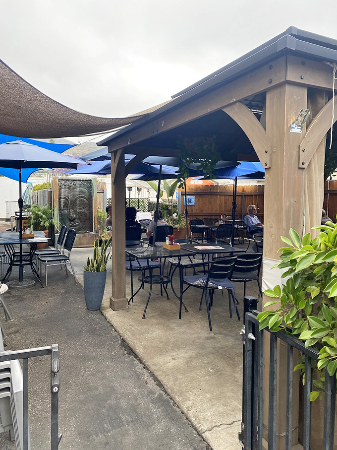 The outdoor patio—where pancake dreams come true under umbrellas and the gentle California breeze.