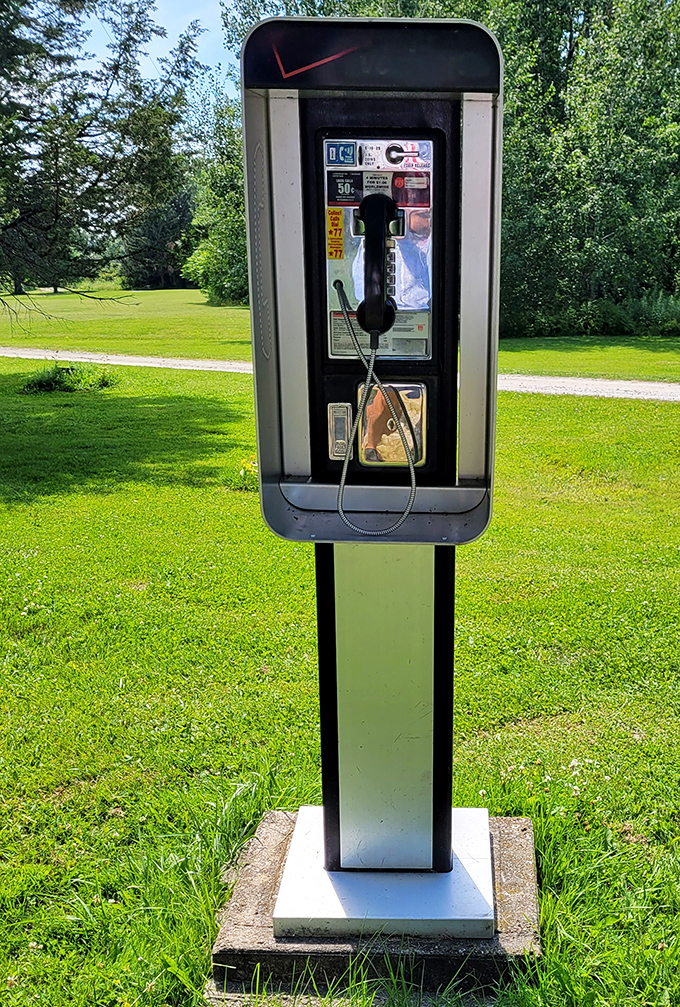 Yes, that's an actual payphone, a relic reminding us that disconnecting is sometimes the best connection.