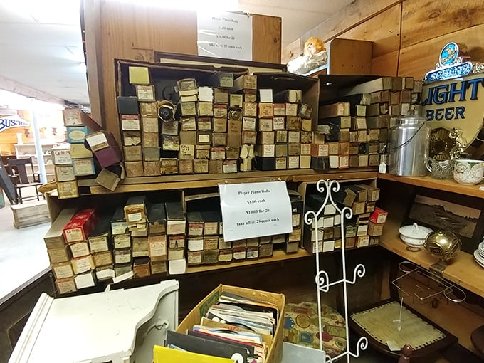 Piano rolls! The original music streaming service from a century ago, now preserved as both decoration and musical history.