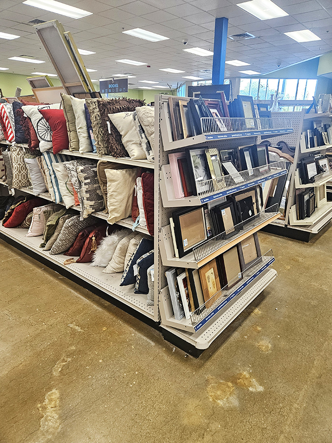 Pillow talk! Cushions and frames create a home d&eacute;cor wonderland where coastal themes meet woodland motifs in true Maine fashion.