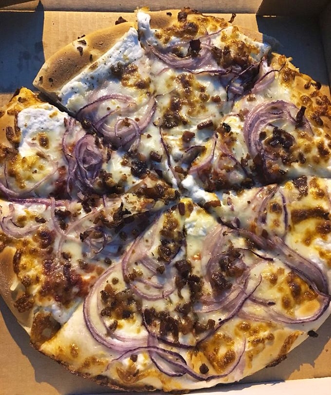 This potato pizza might raise Italian eyebrows, but one bite of those golden spuds with caramelized onions will convert even the staunchest traditionalists.