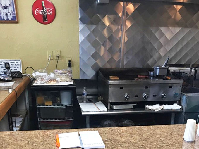 The flat-top grill where the magic happens &ndash; this is command central for caramelized onion alchemy and burger brilliance.