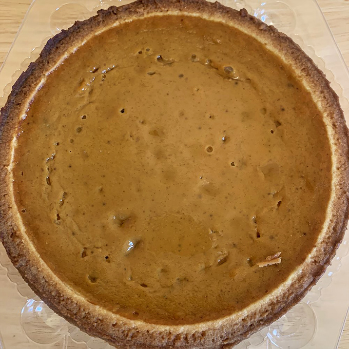 Homemade pumpkin pie with that perfect golden filling that makes autumn worth celebrating beyond pumpkin spice everything.