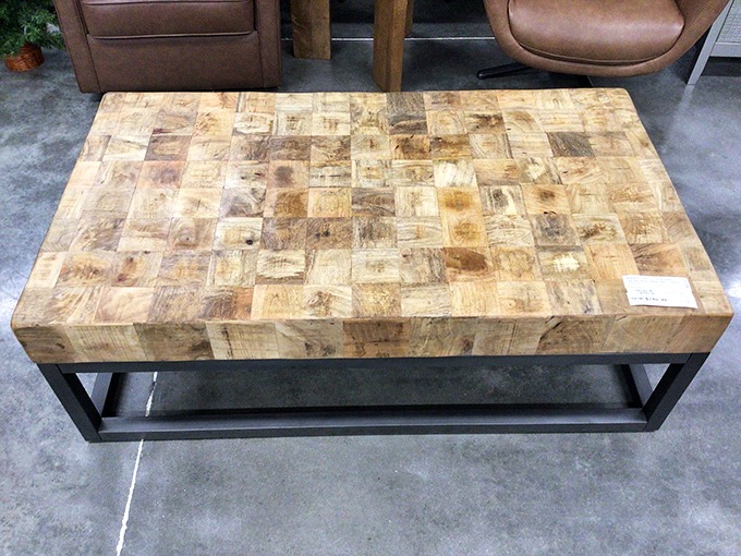 Industrial-meets-rustic coffee table that could cost a fortune at trendy furniture stores but here waits for its forever home.