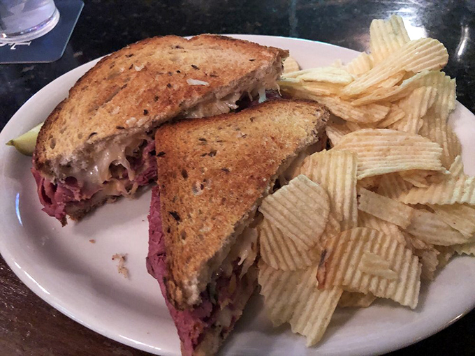 The Reuben: where corned beef, sauerkraut, and melted cheese create a sandwich symphony that hits all the right notes.